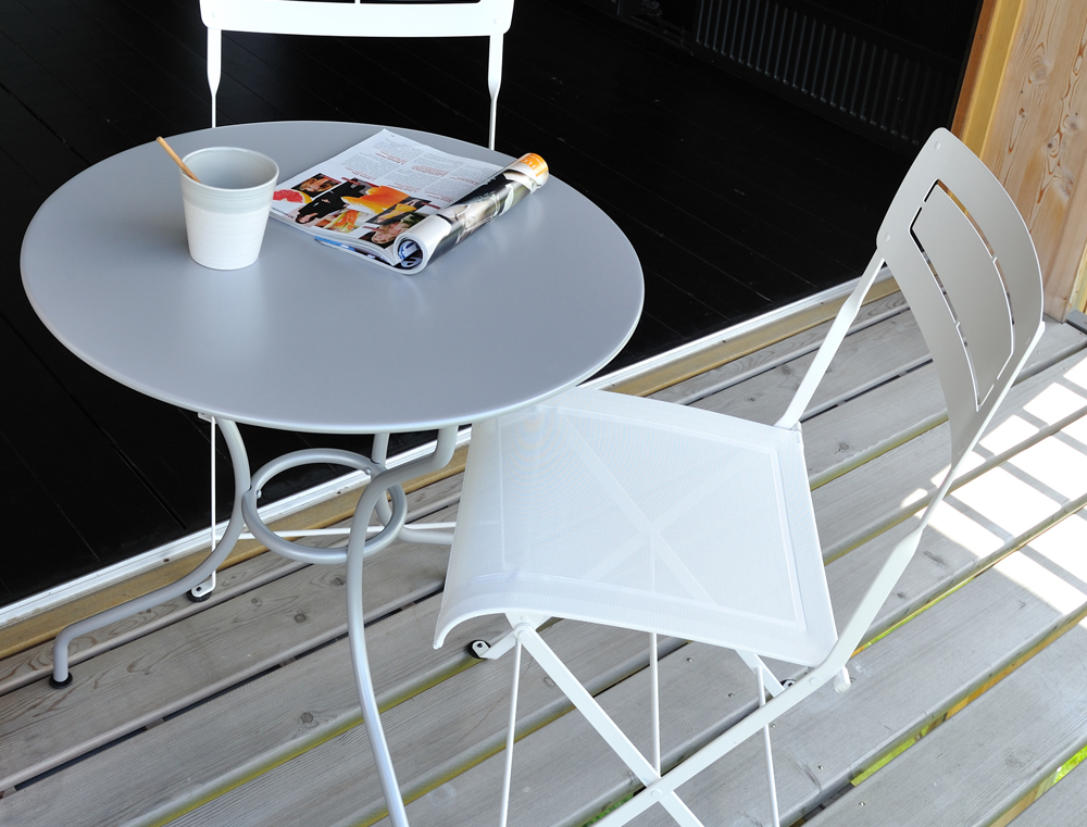 Opéra table Ø 67 cm by Fermob and available from le petit jardin